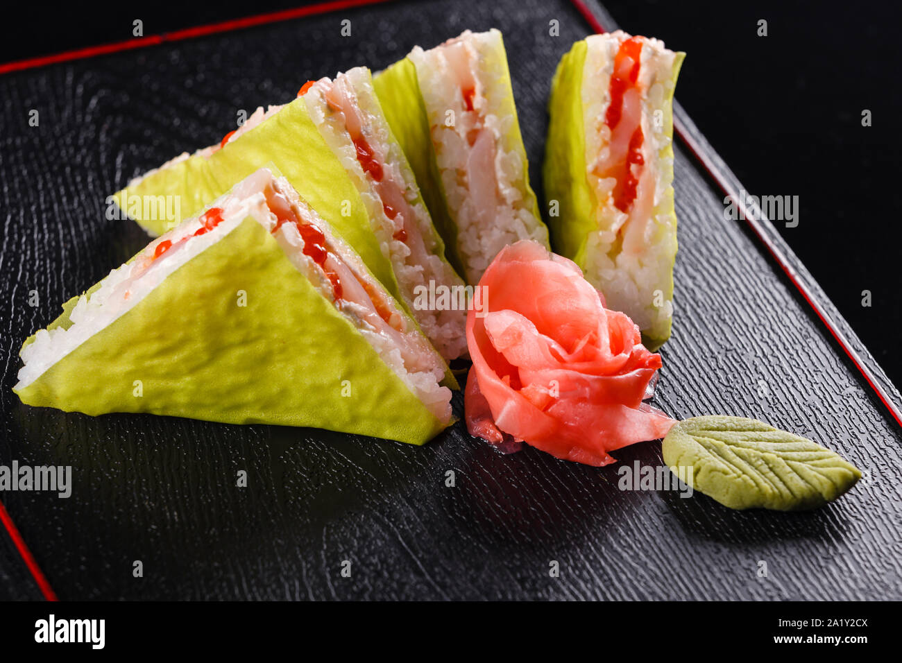 Triangular pieces. Japanese food, tasty of meal for lunch. Seafood ...