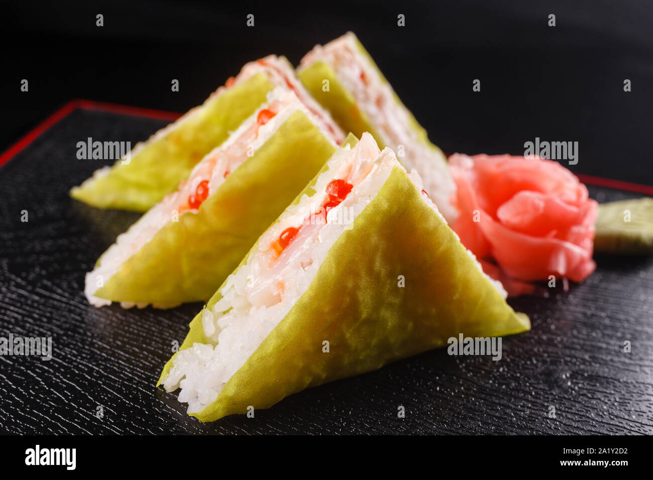 Triangular pieces. Japanese food, tasty of meal for lunch. Seafood ...