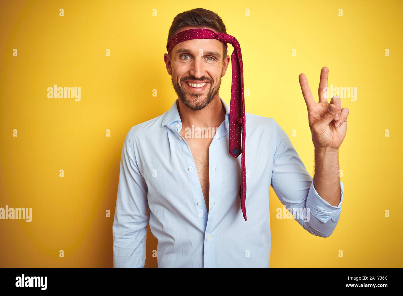 Hangover business man drunk and crazy for hangover wearing tie on head ...