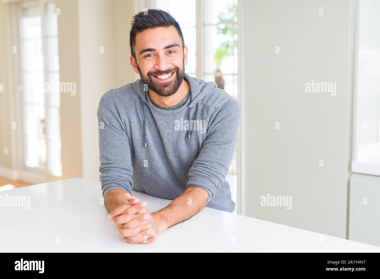 Handsome man smiling cheerful with a big smile on face showing teeth ...
