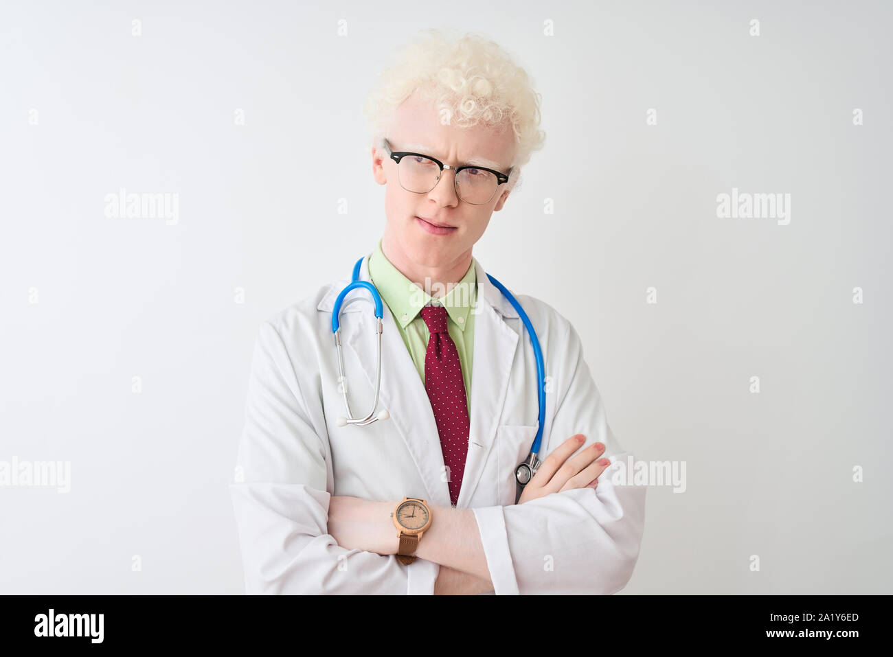 Young albino doctor man wearing stethoscope standing over isolated ...