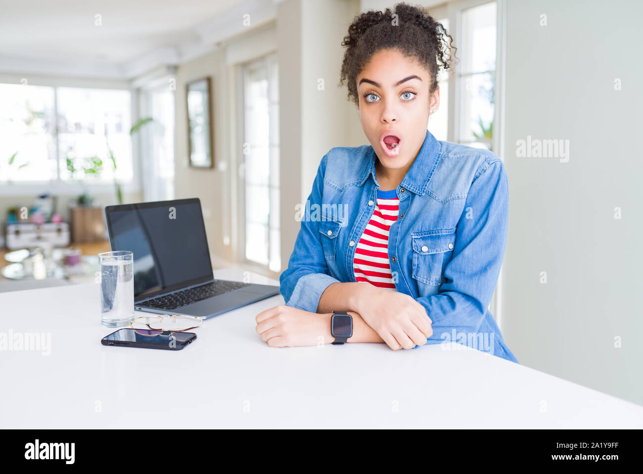 Young african american business woman working using computer laptop ...