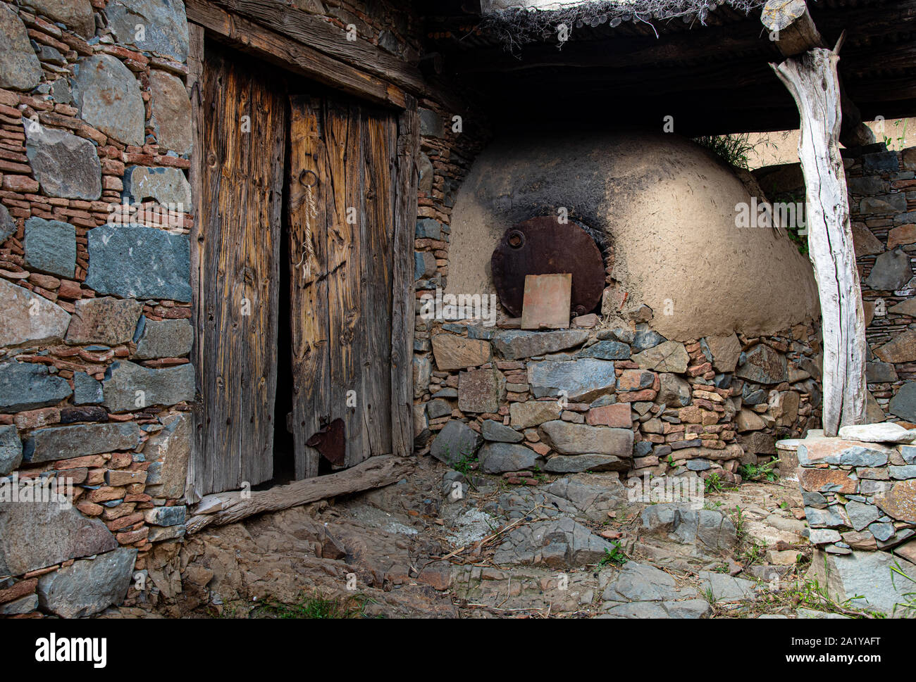 Traditional house exterior courtyard with clay oven at the village of ...