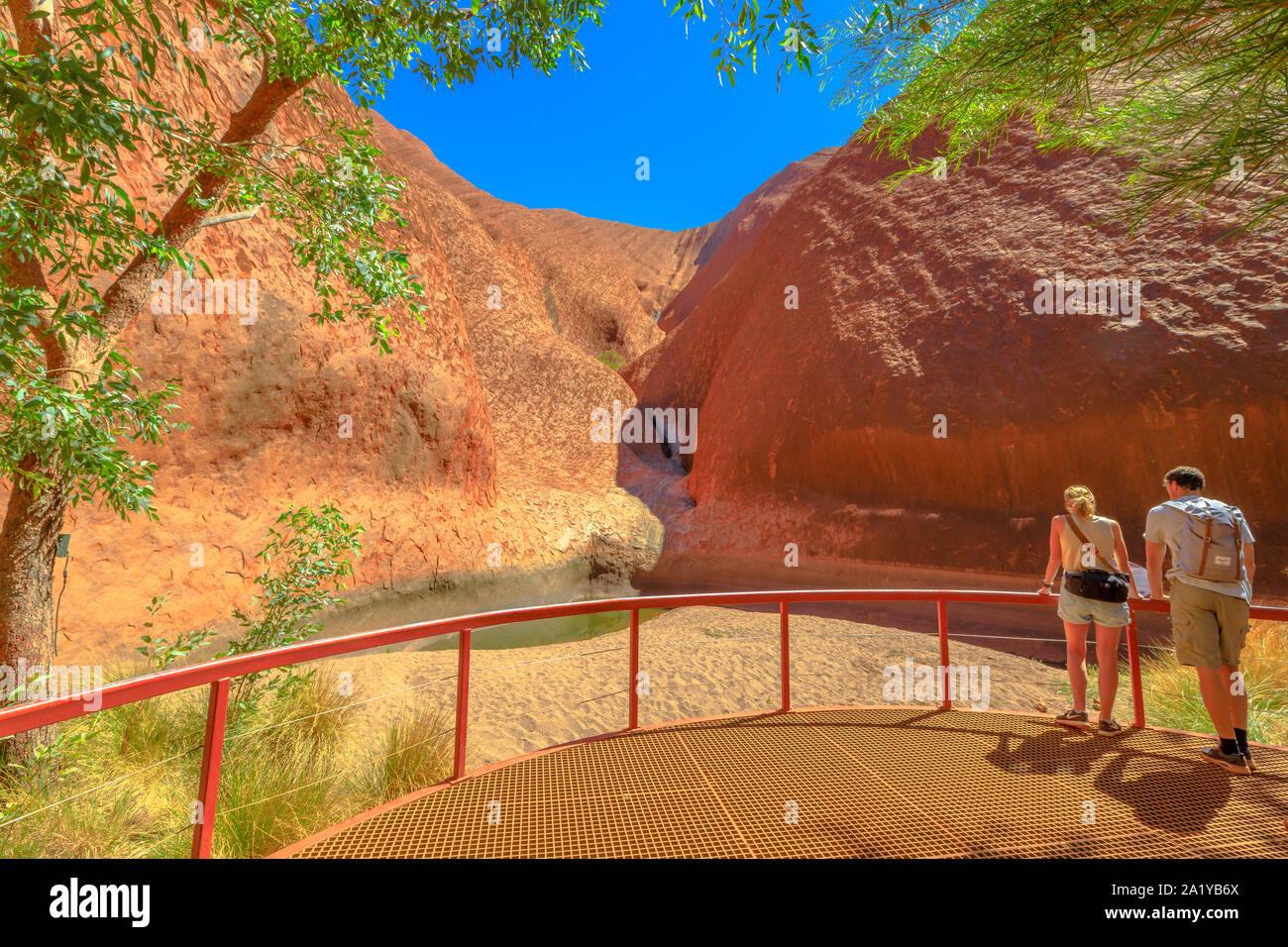 Uluru, Northern Territory, Australia - Aug 24, 2019: couple looking ...