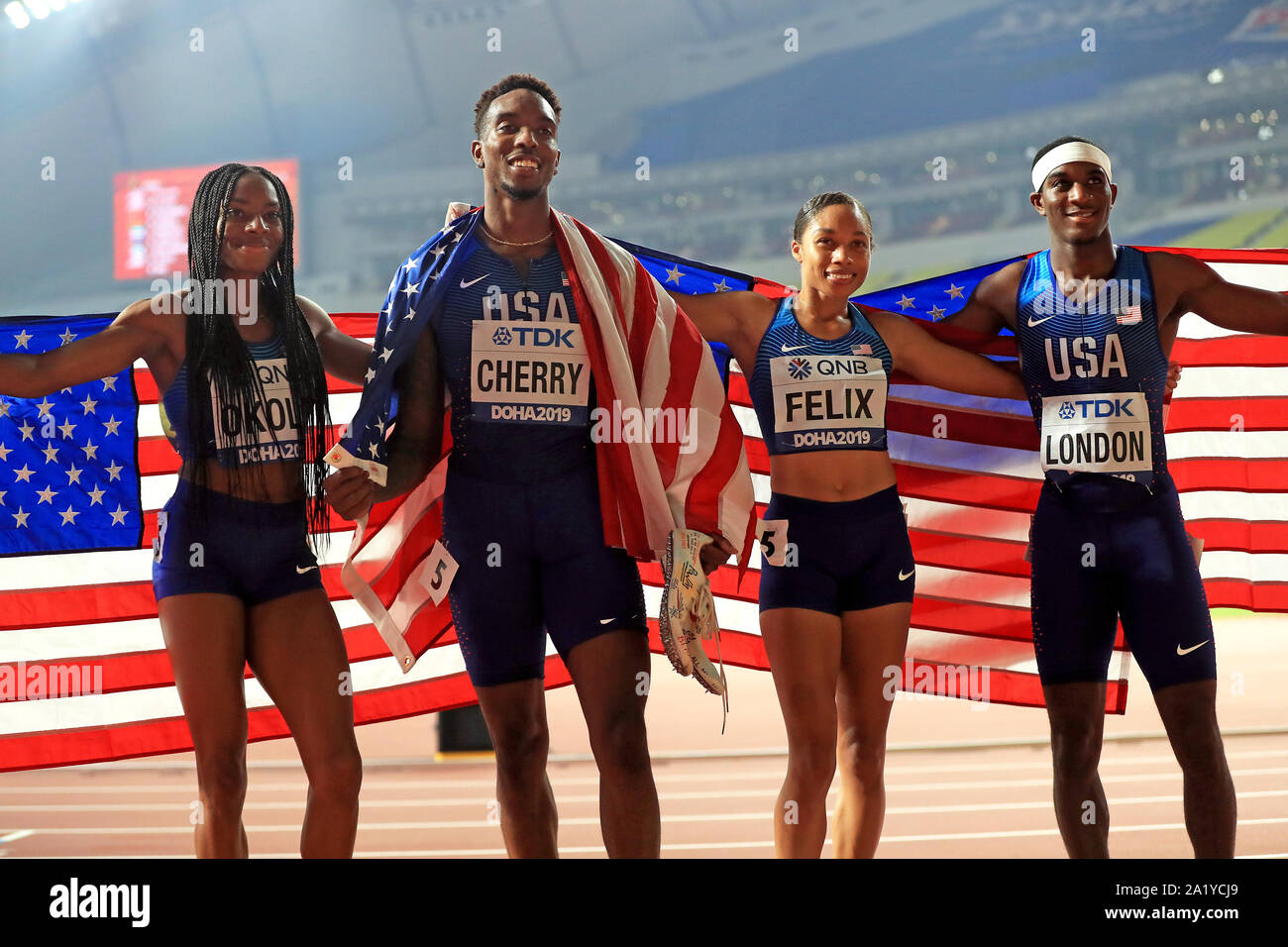 USA's Courtney Okolo (left), Michael Cherry, Allyson Felix and Wilbert ...