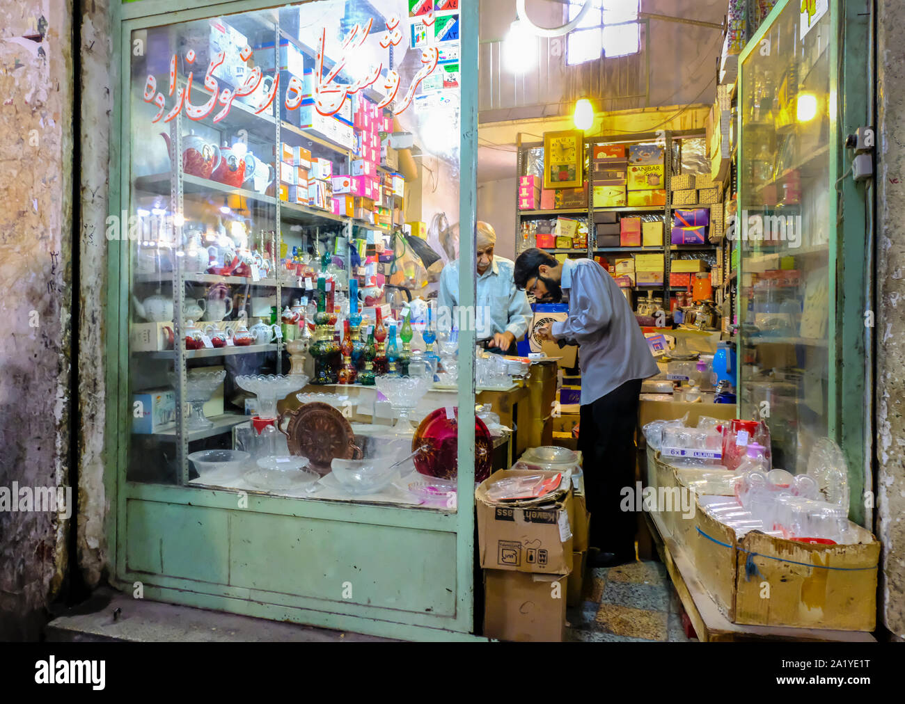 Men in a shop Stock Photo - Alamy
