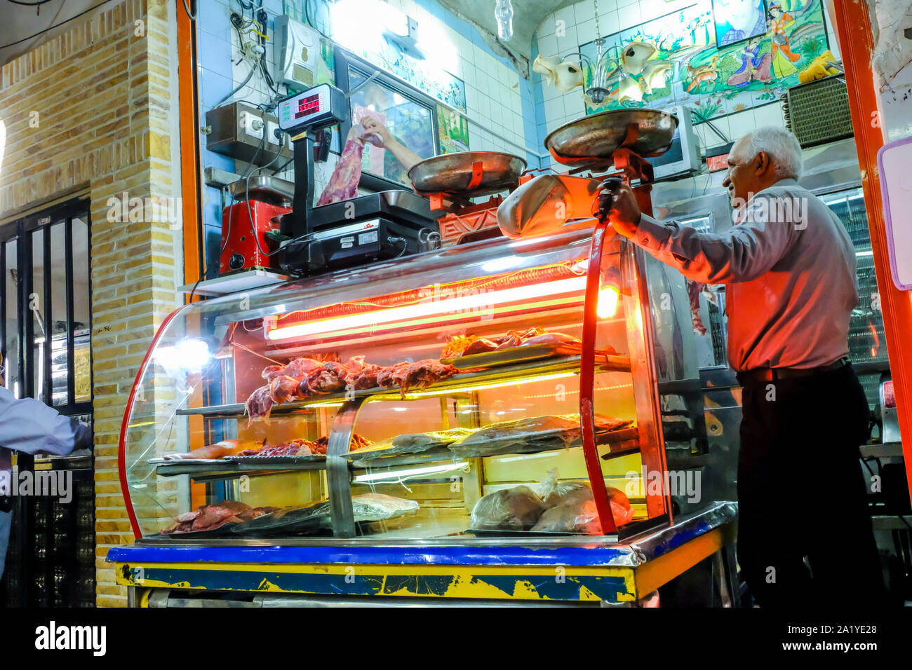 Man in a butcher´s. Grand Bazaar. Kashan, Iran. Asia Stock Photo - Alamy