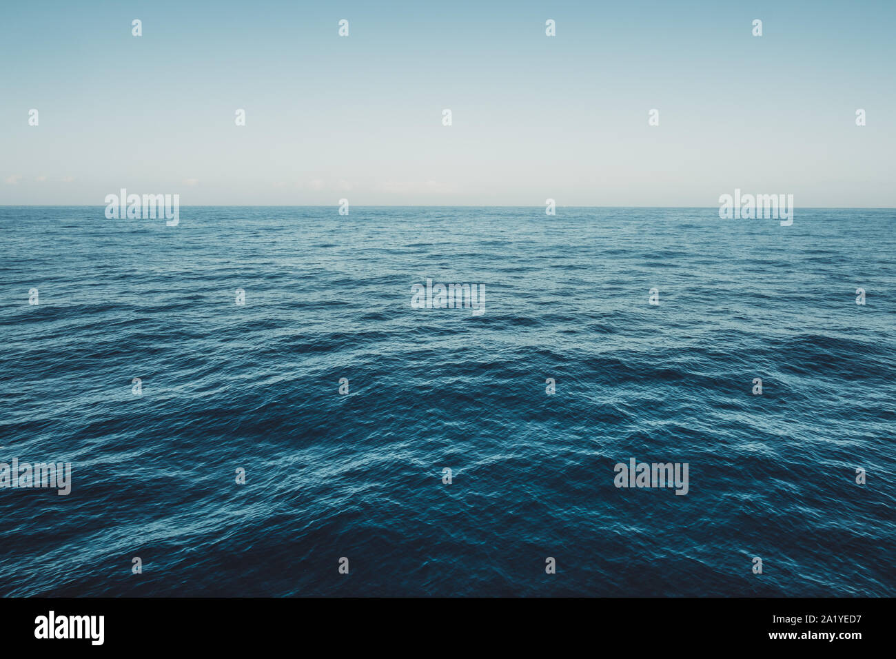 Calm sea surface with waves at sunny day - ocean background Stock Photo ...