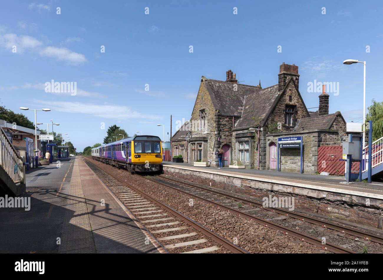 Arriva Northern Rail class 142 pacer + class 150 sprinter at Burscough Bridge railway station ...