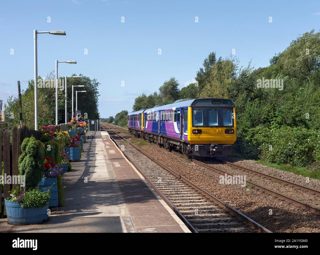 Northern rail class 142 pacer trains142067 + 142054 passing Bescar Lane railway station ...
