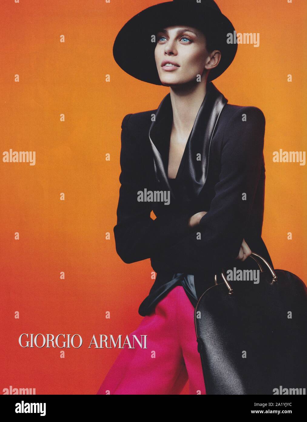 poster advertising Giorgio Armani with Aymeline Valade in paper ...