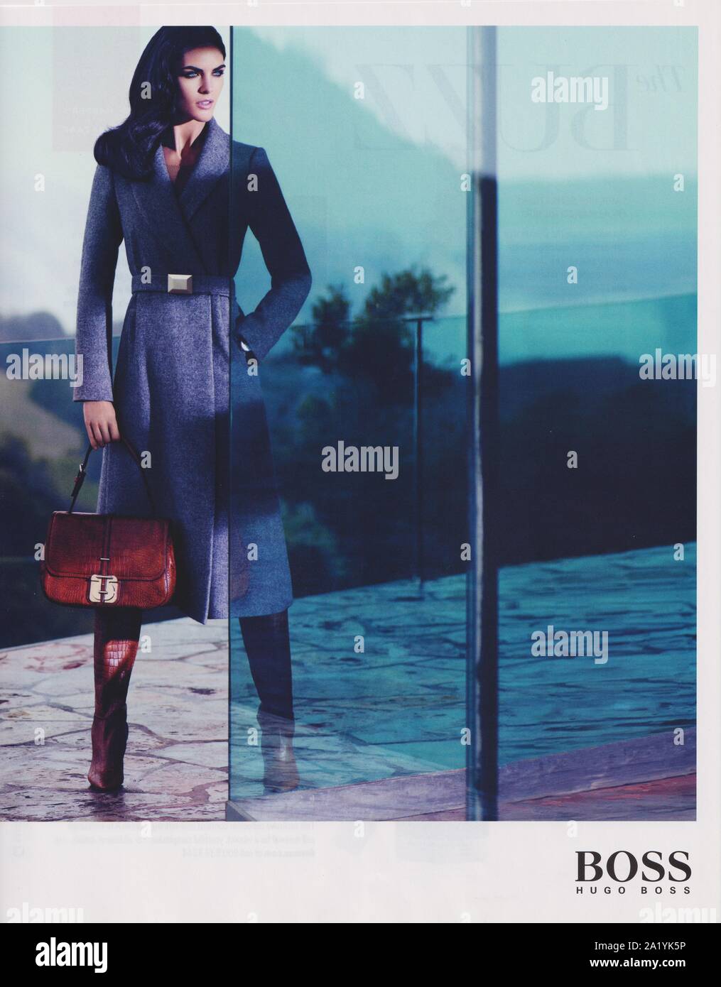 poster advertising Hugo Boss fashion house with Hilary Rhoda in paper ...