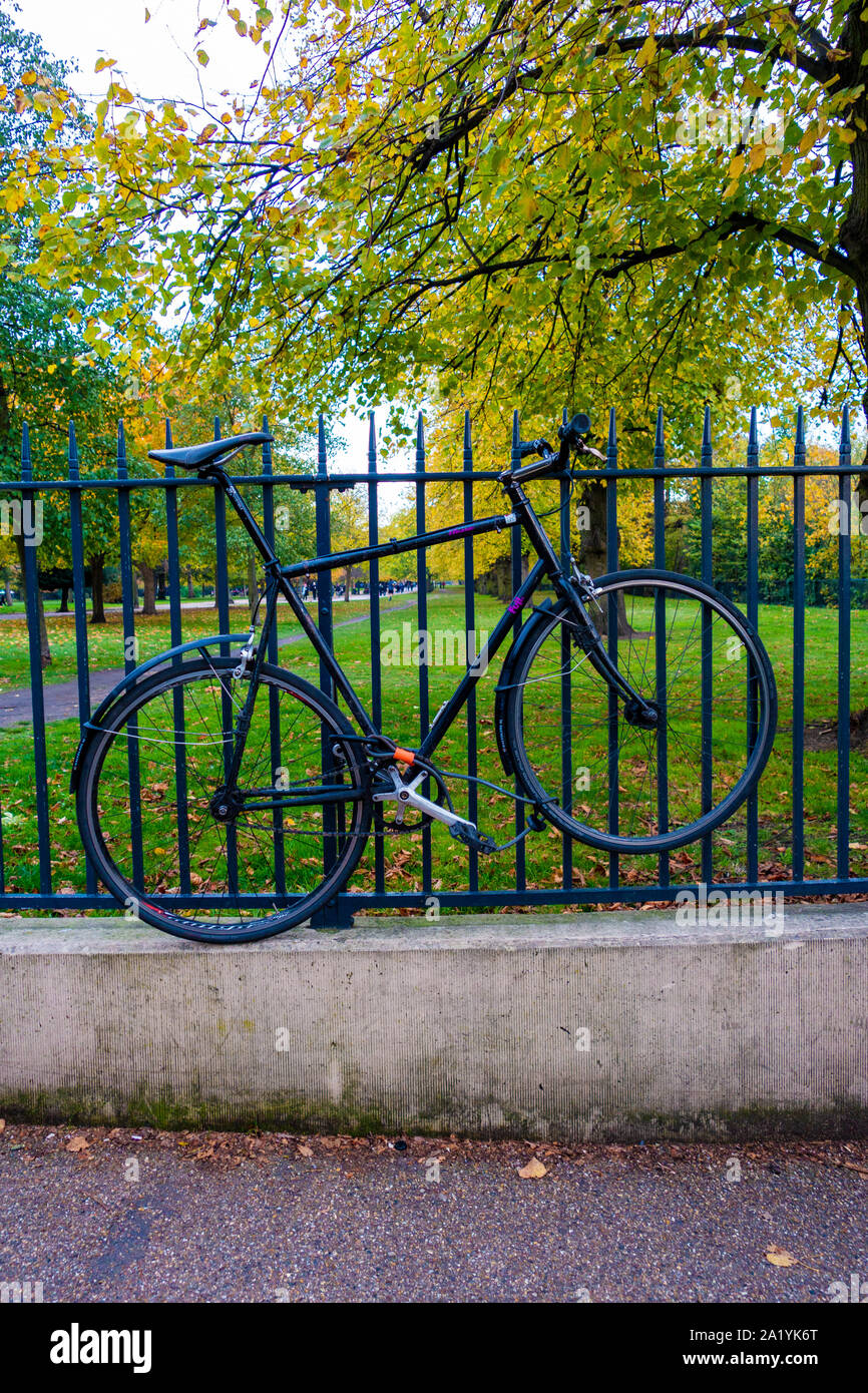 Bike fence parked railings hi-res stock photography and images - Alamy