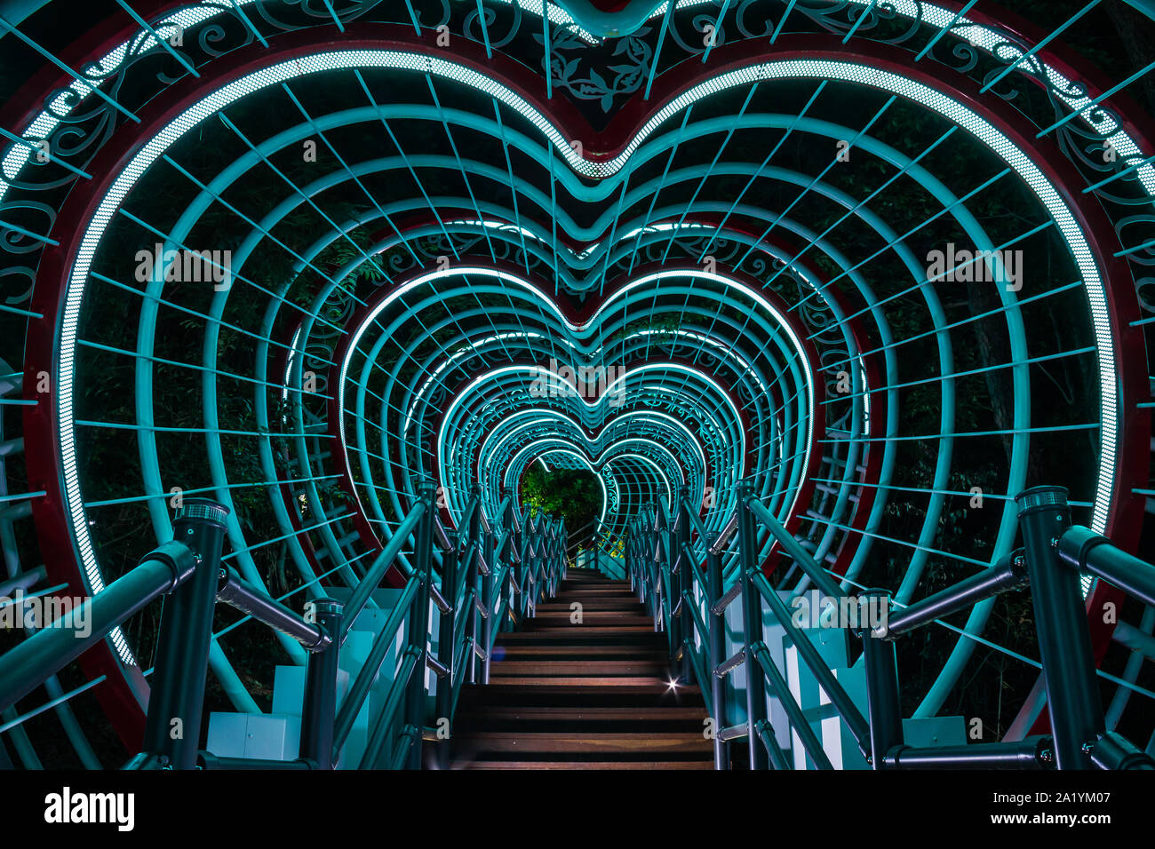 A stairway leading through a tunnel of hearts in Jewangsan Park in ...