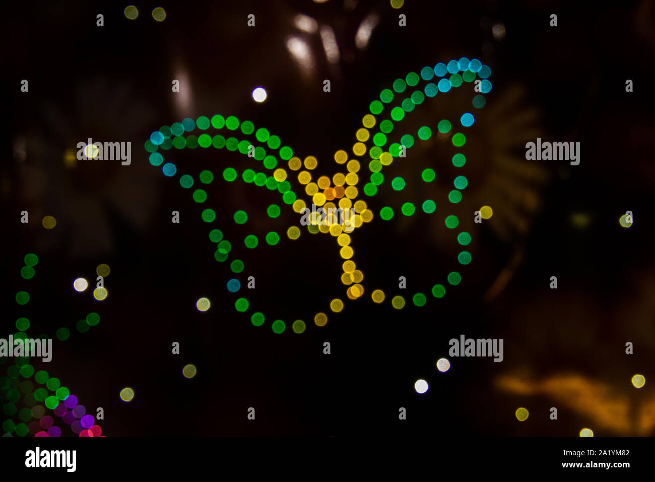 A butterfly formed by LED lights and the Bokeh effect in various colors ...