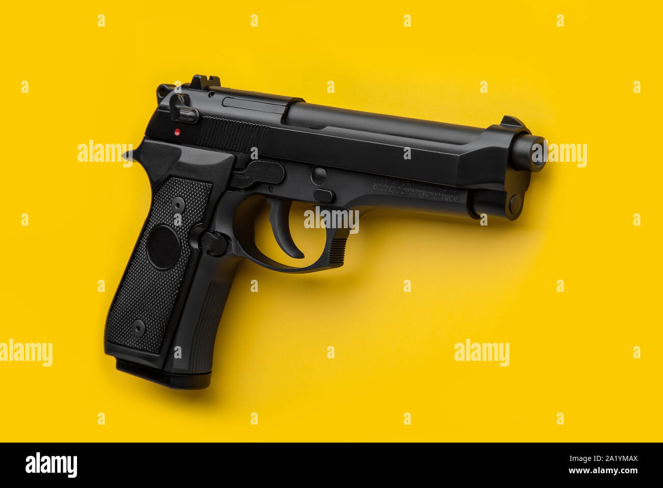 Modern black gun on a yellow background. Weapons for the police ...
