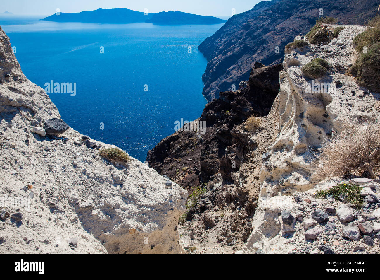 Santorini cliffs along the walking path number 9 between the cities of ...