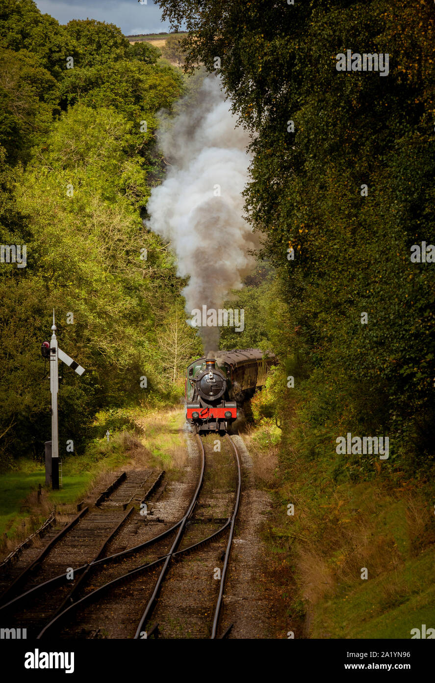 Railway engine 6990 Witherslack Hall, pulling into Goathland station ...