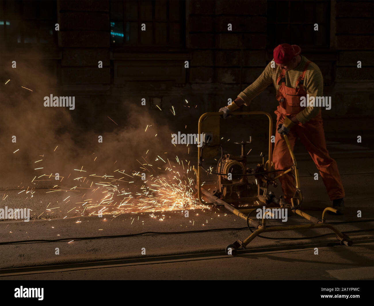 Workman cutting hi-res stock photography and images - Alamy