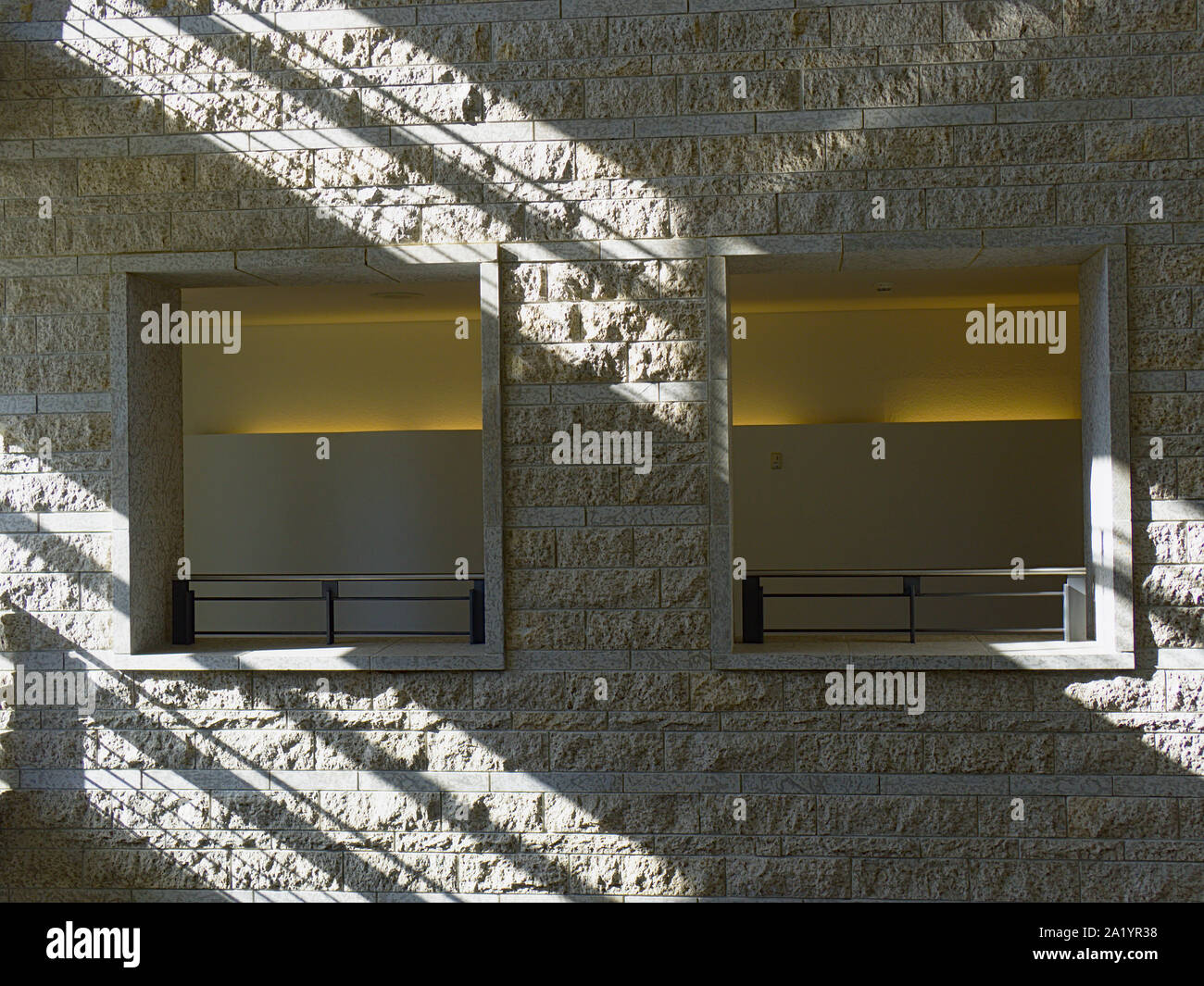 Inside Ottawa City Hall, open windows cut into the marble wall, with ...