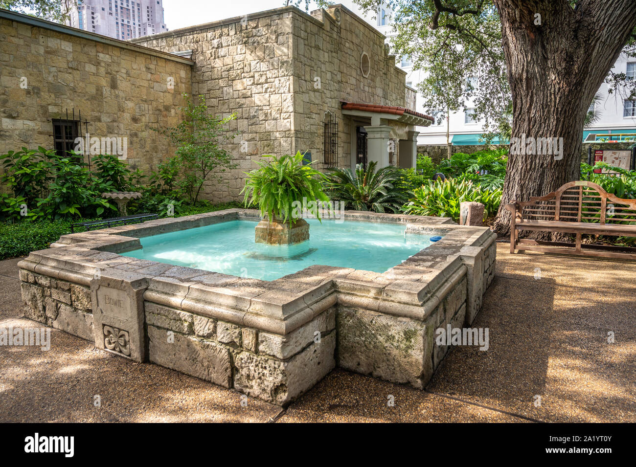 A fountain dedicated to Davy Crockett in the courtyard of The Alamo ...