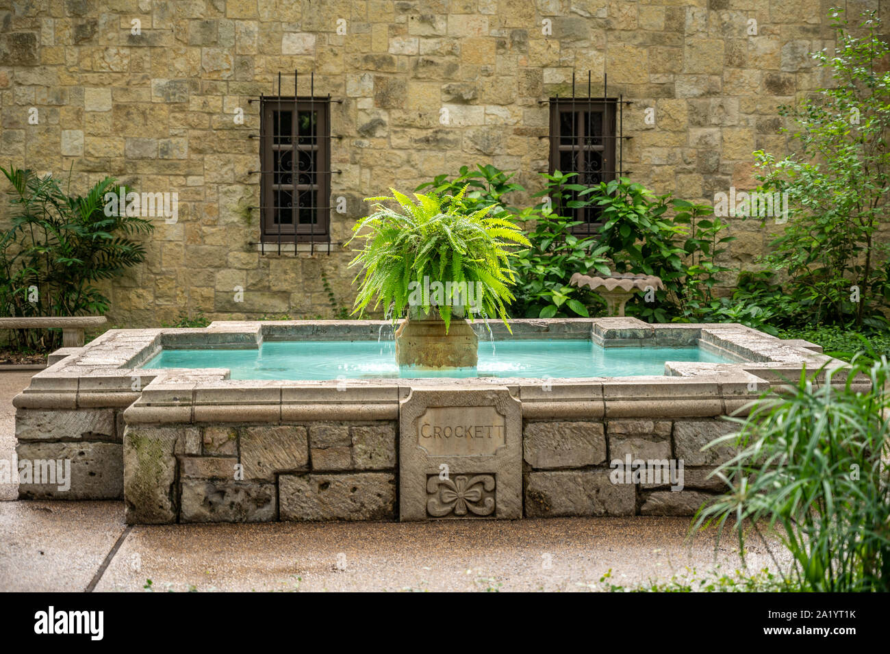 A fountain dedicated to Davy Crockett in the courtyard of The Alamo ...