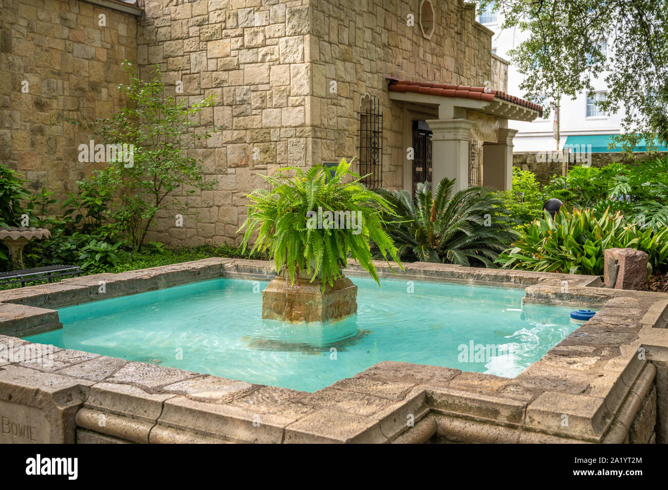 A fountain dedicated to Davy Crockett in the courtyard of The Alamo ...
