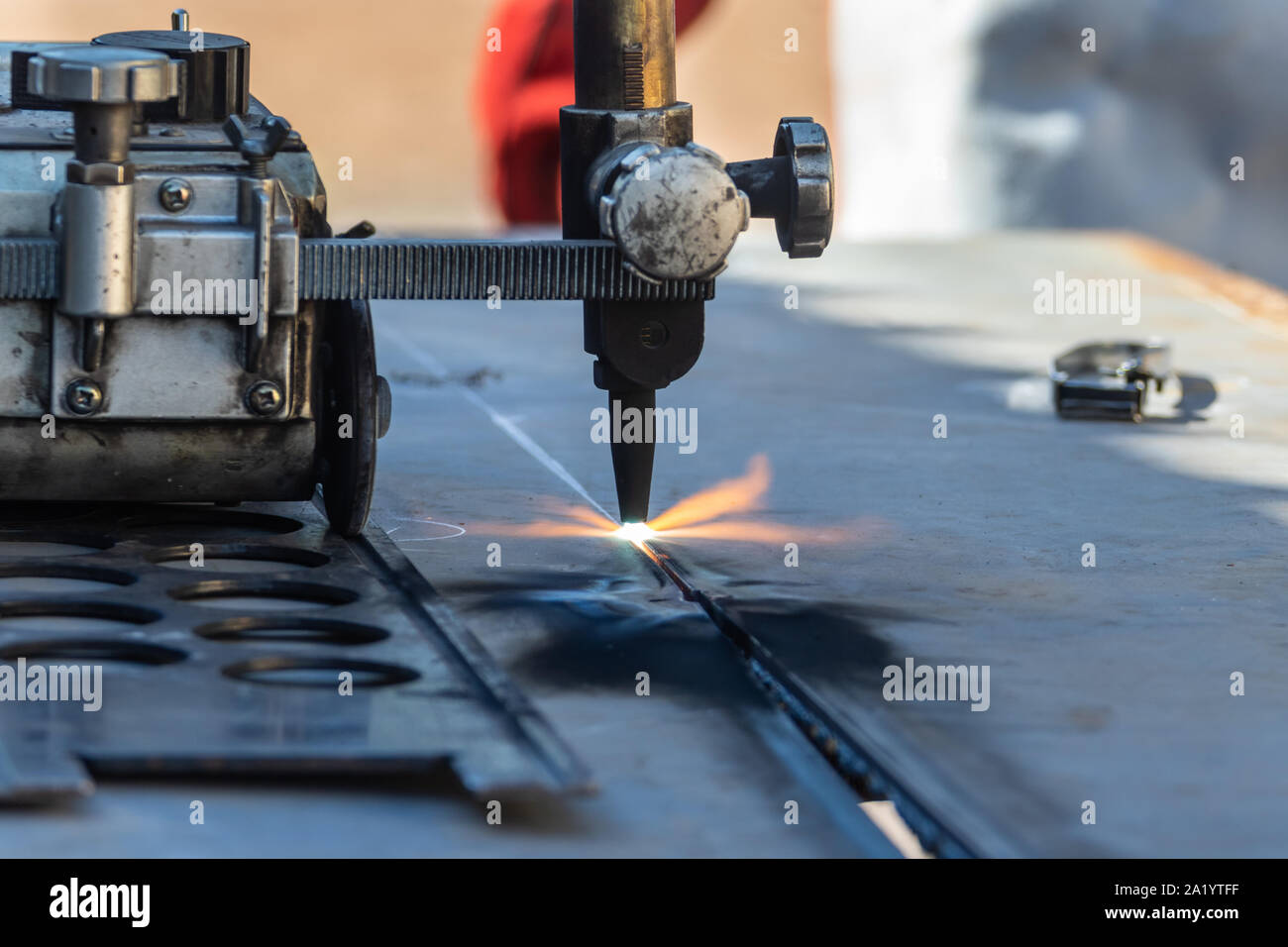 Motswana welder worker in a Botswana workshop, using an acetylene torch ...