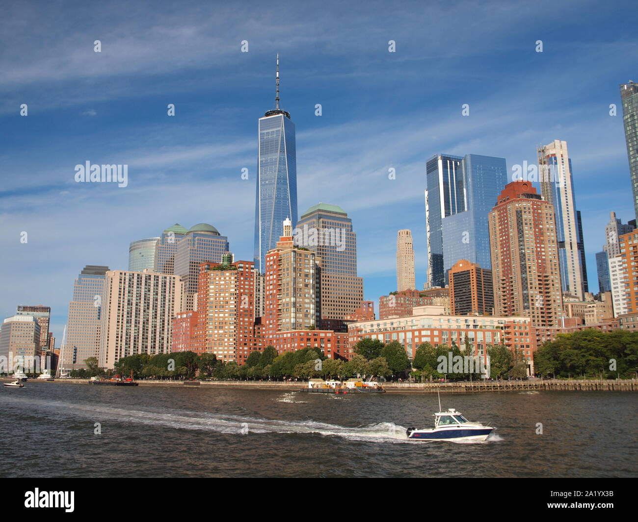 New York City skyline viewed from the Hudson River. In the distance is ...