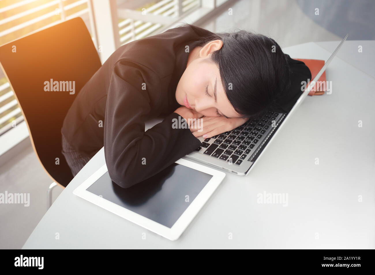 Exhausted businesswomen hi-res stock photography and images - Alamy