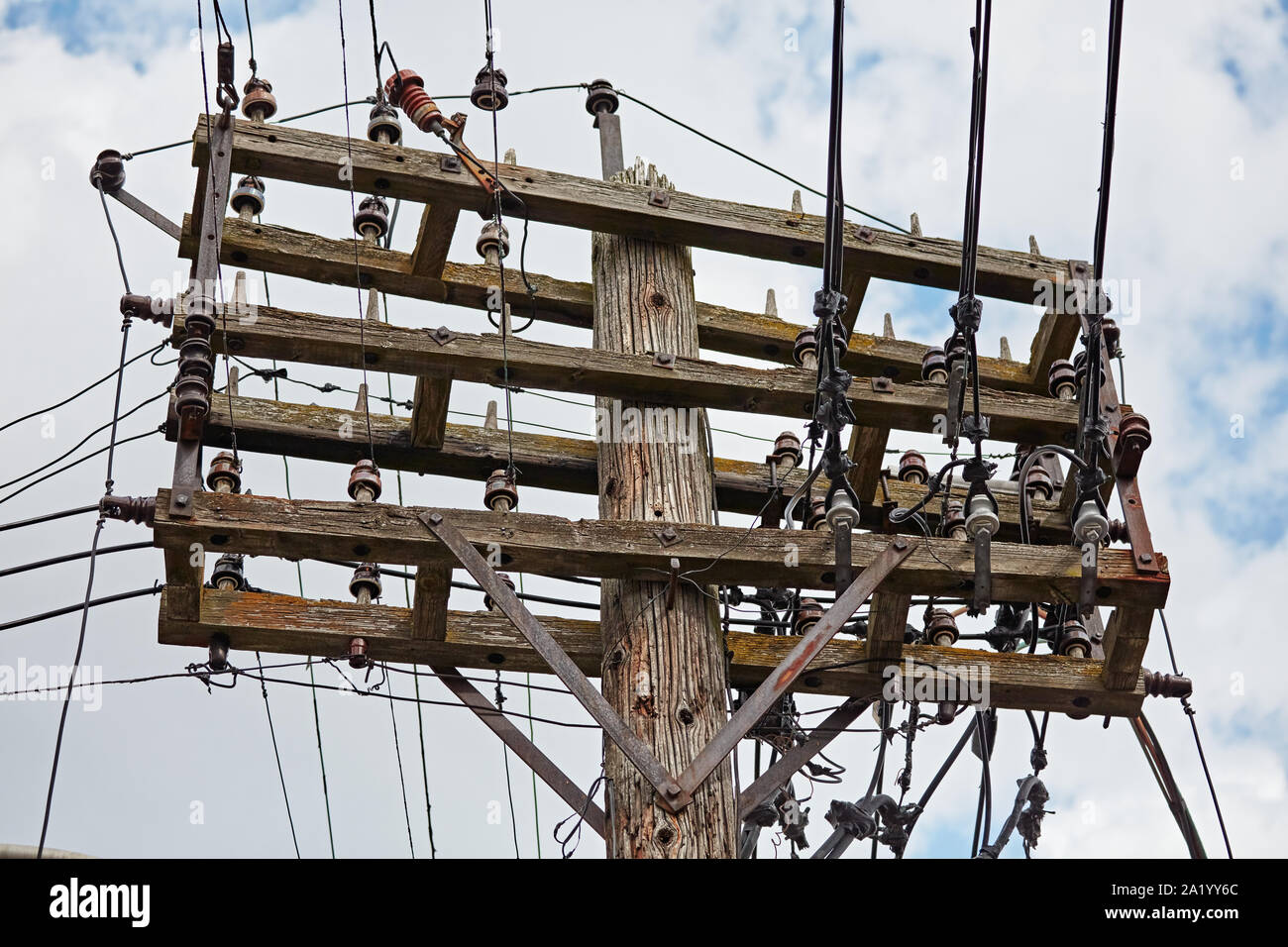 Wooden electrical pole Stock Photo - Alamy