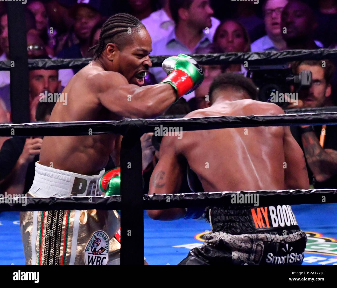 ( in Black trunks) Errol Spence Jr. goes 12 rounds with Shawn Porter at ...