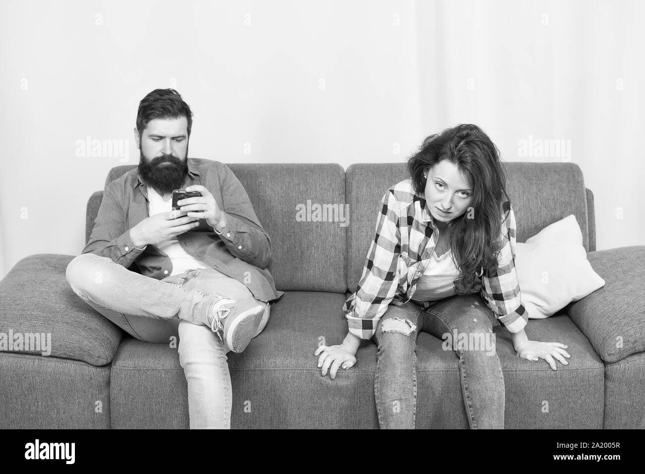 Couple despair sofa Black and White Stock Photos & Images - Alamy