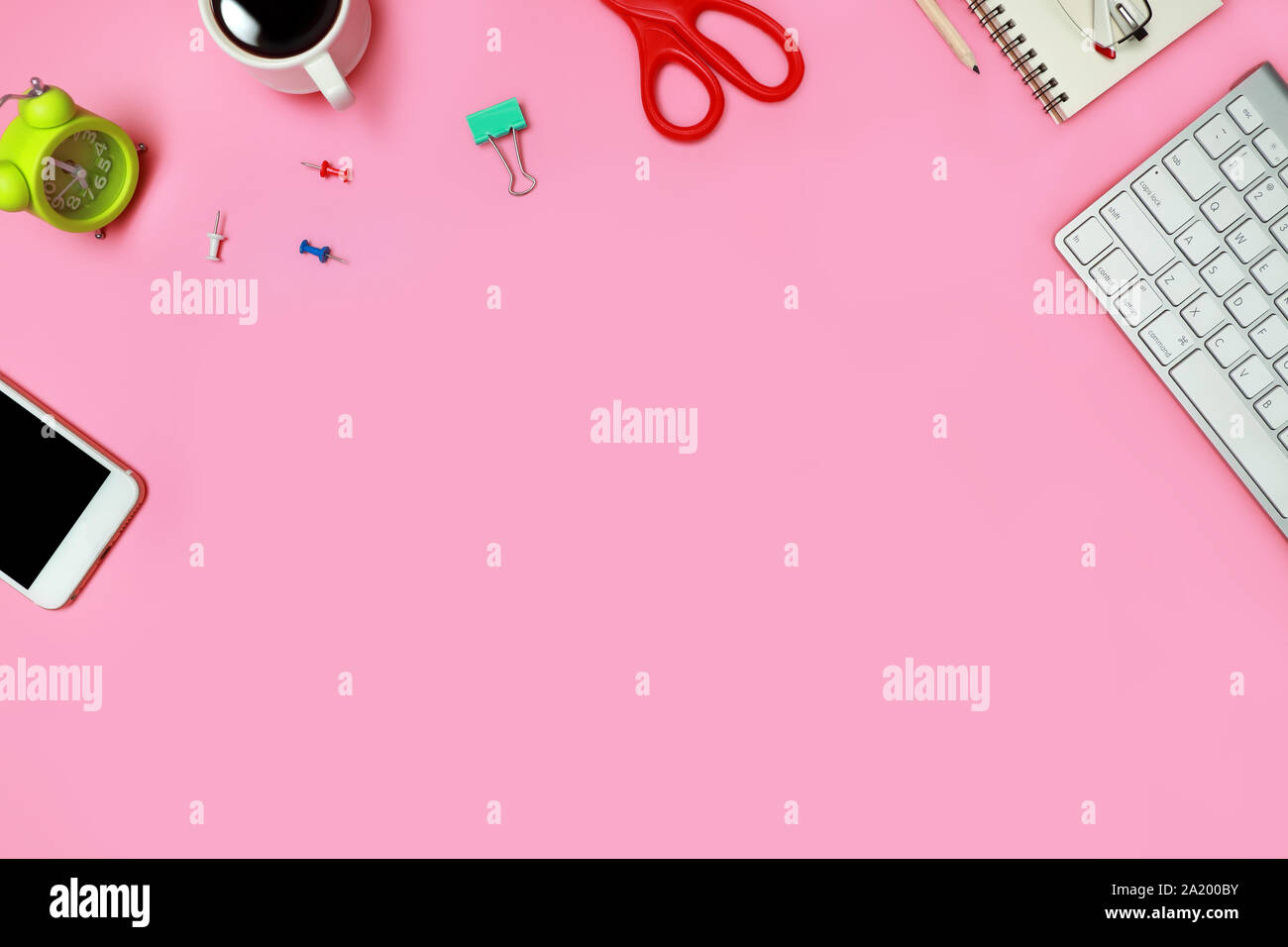 top view or flat lay pink pastel office desk with computer, office ...