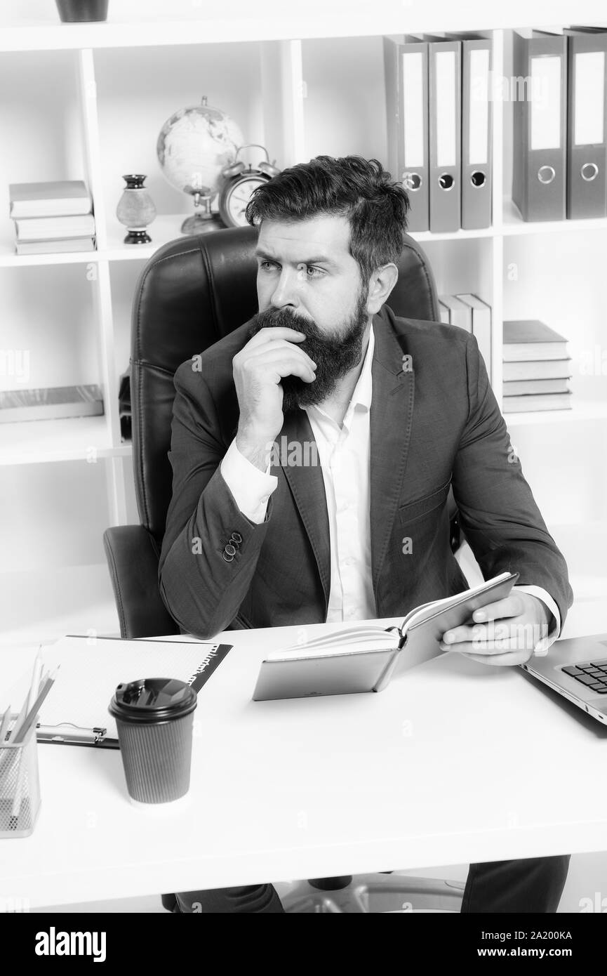 Busy boss in office. Check if i have time today. Man bearded hipster ...