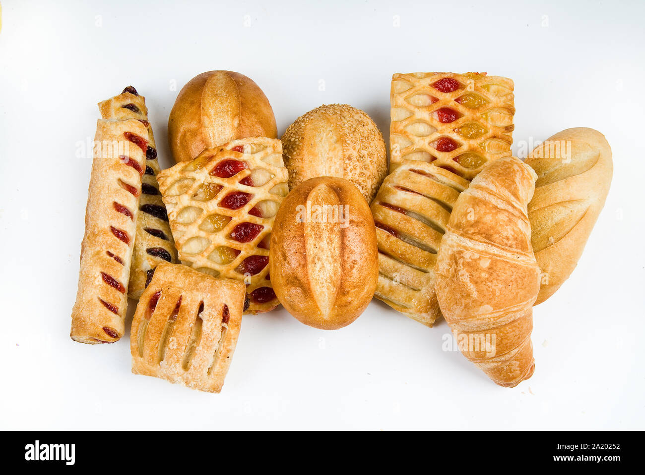 Different kinds of bread on a studio background Stock Photo - Alamy