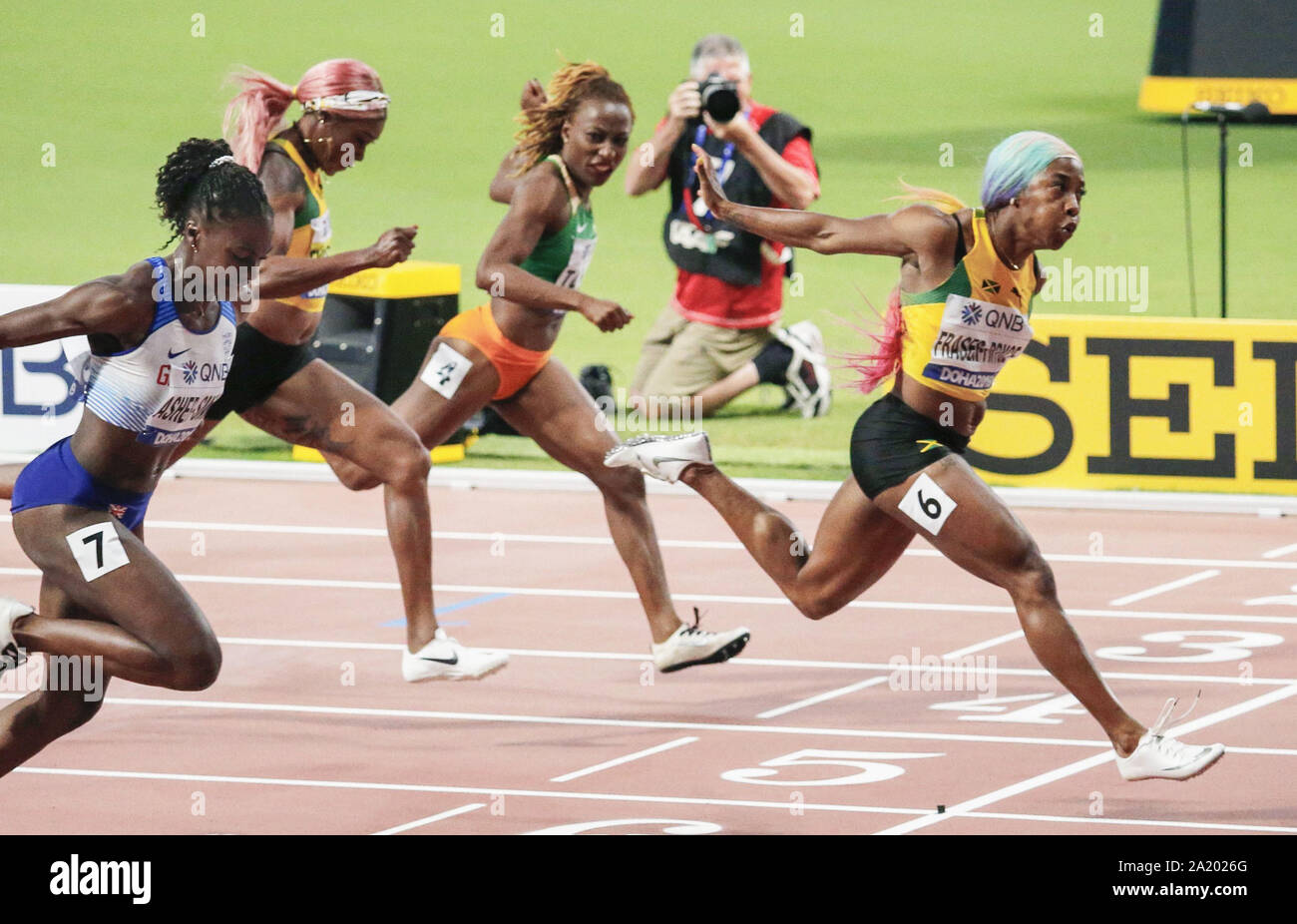 Shelly-Ann Fraser-Pryce (far R) of Jamaica wins the women's 100-meter ...