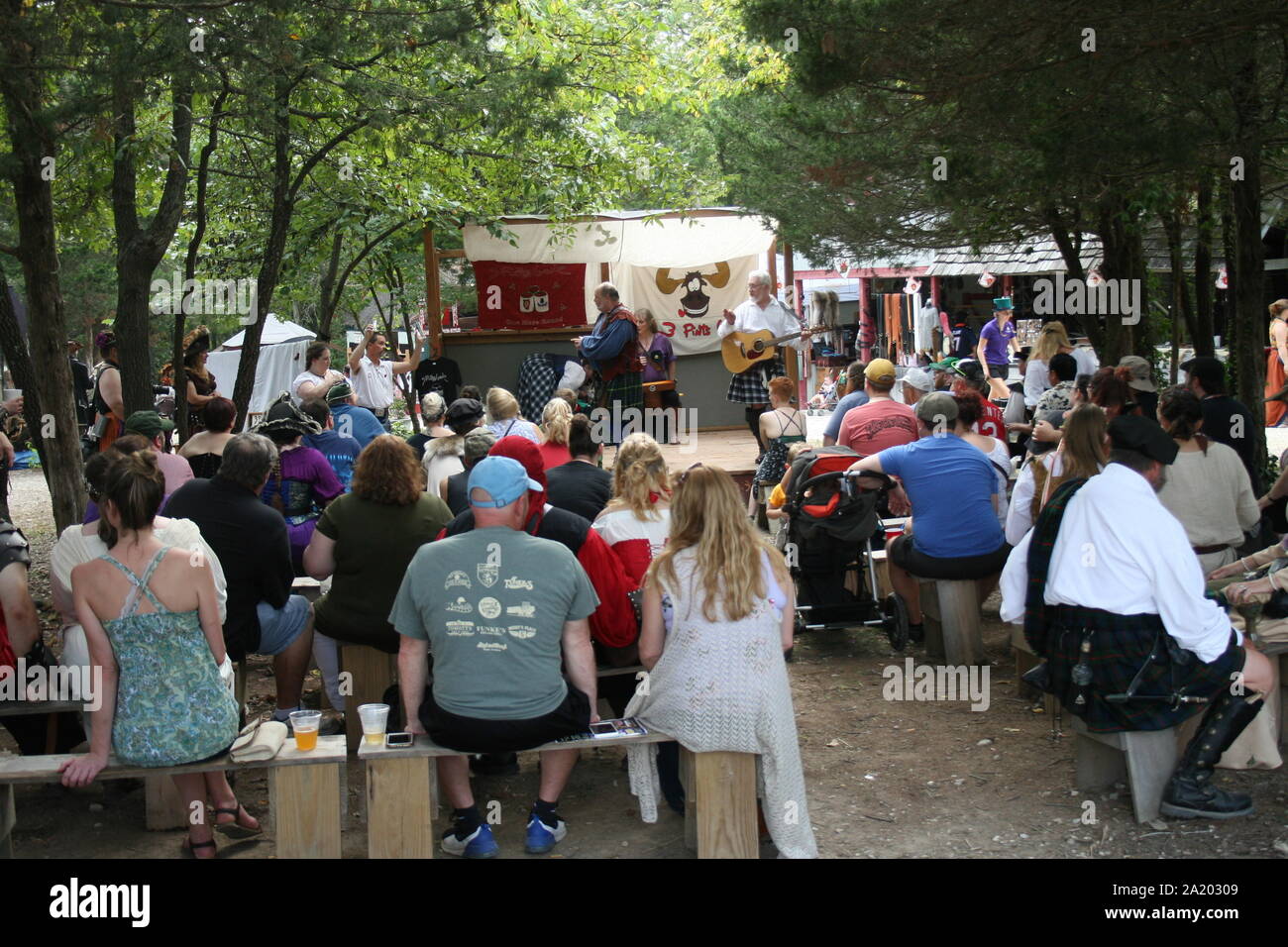 Fair goers watch a presentation Stock Photo - Alamy