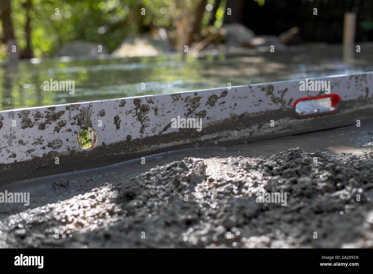 Picture of a straight metal board to level fresh concrete floor Stock ...