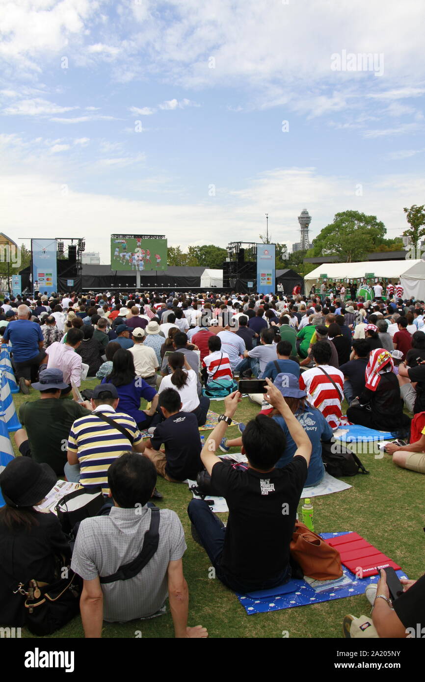 People watch the Rugby World Cup match between Argentina and Tonga in a ...