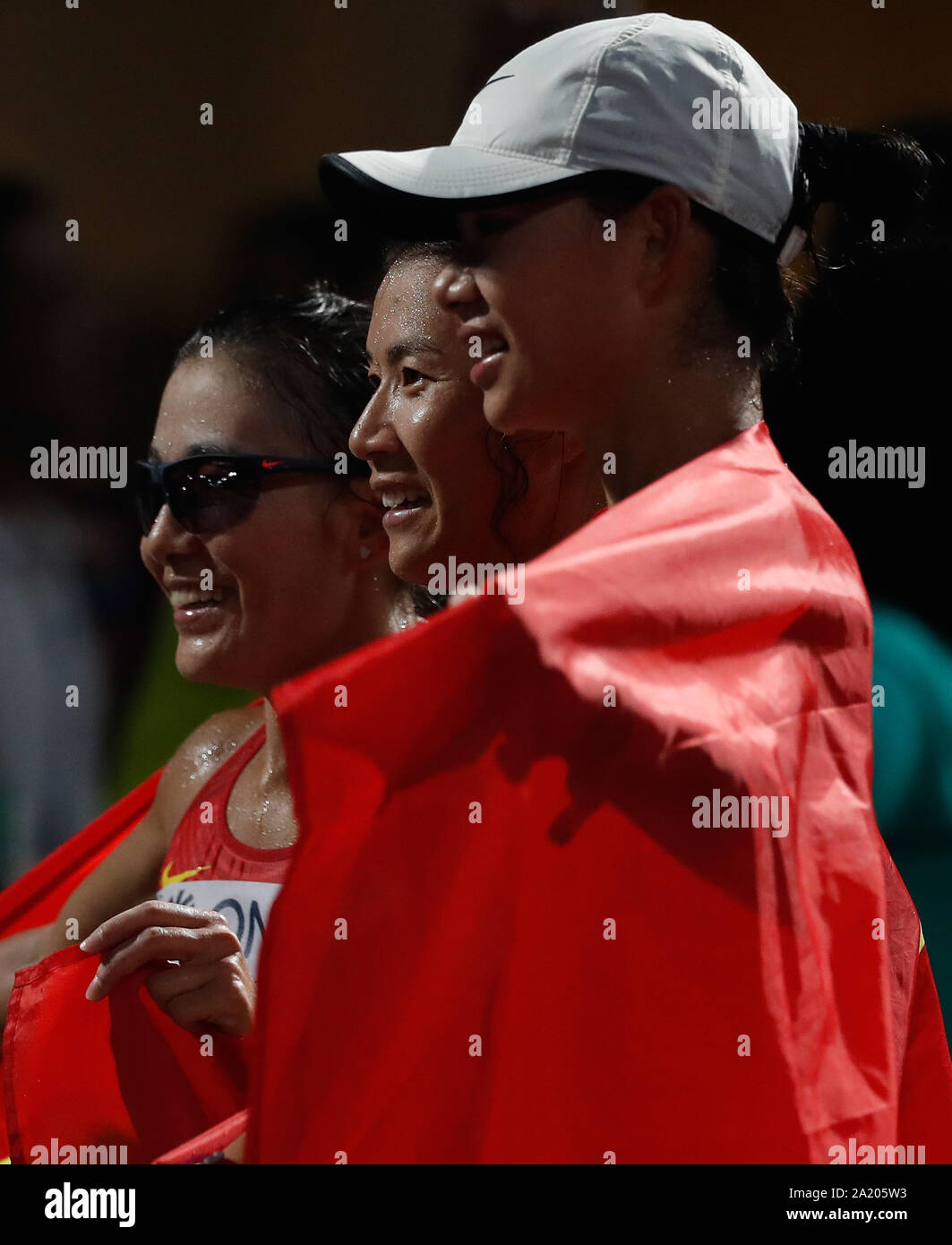 Doha, Qatar. 29th Sep, 2019. China's Liu Hong (C) celebrates with ...