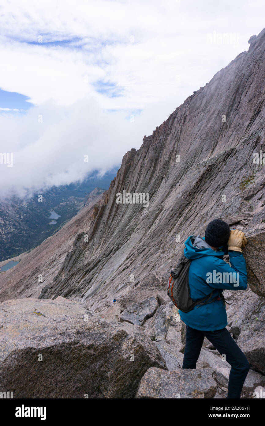 Hiker taking a break on the keyhole route on Longs Peak in Rocky ...