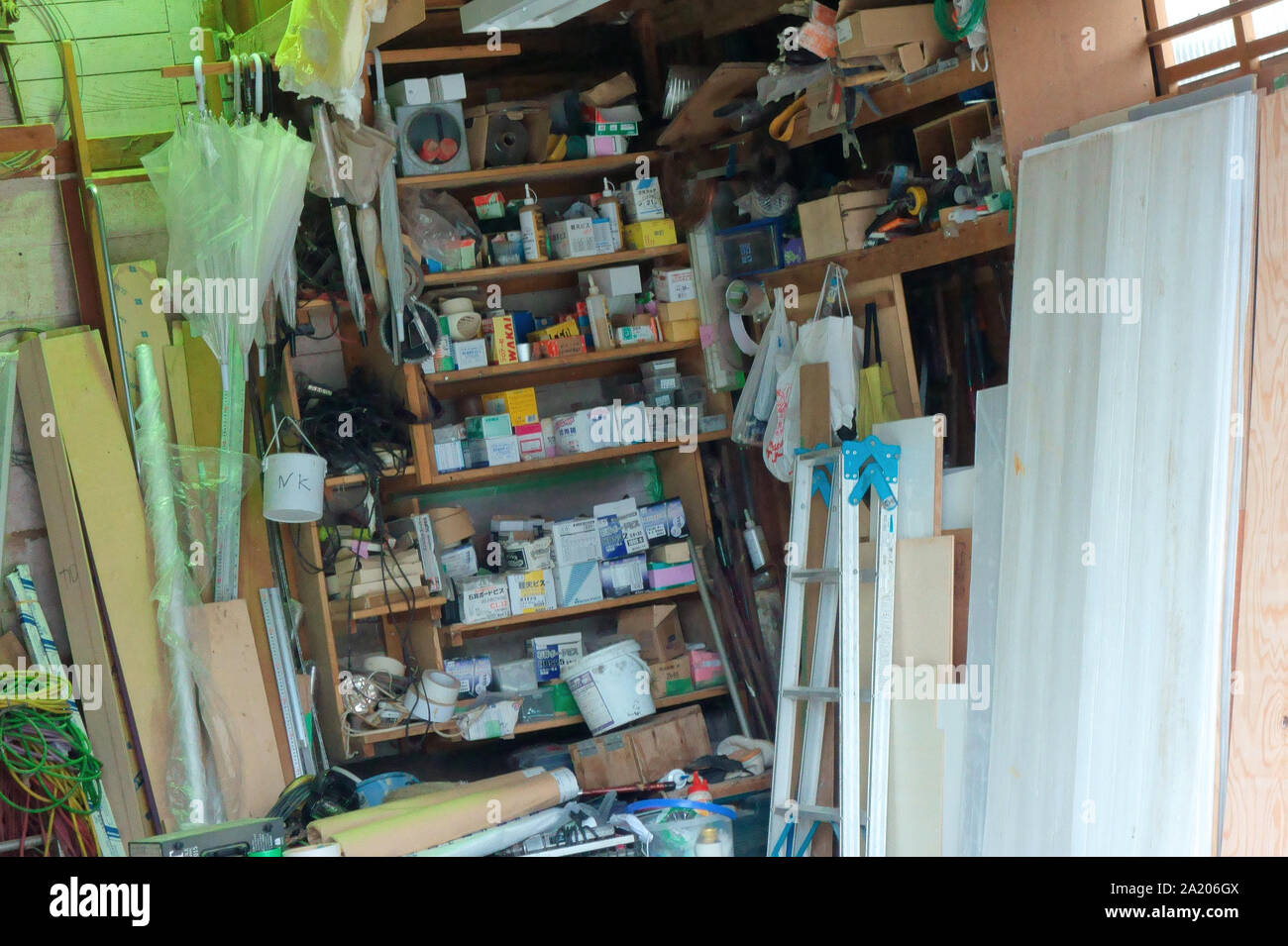 Cluttered warehouse storage Stock Photo - Alamy