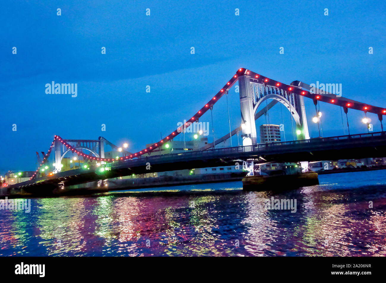 Twinkle bridge piecing twilight Stock Photo - Alamy