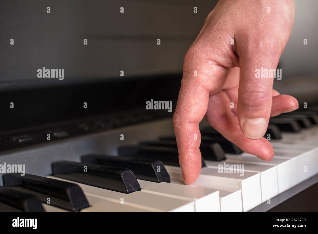 fingers click on the piano keys as if the legs Stock Photo - Alamy
