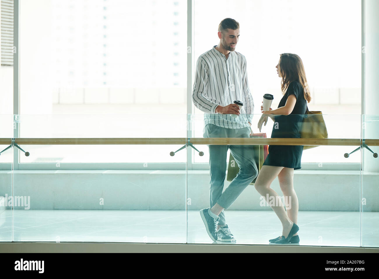 Tall people group talking hi-res stock photography and images - Alamy