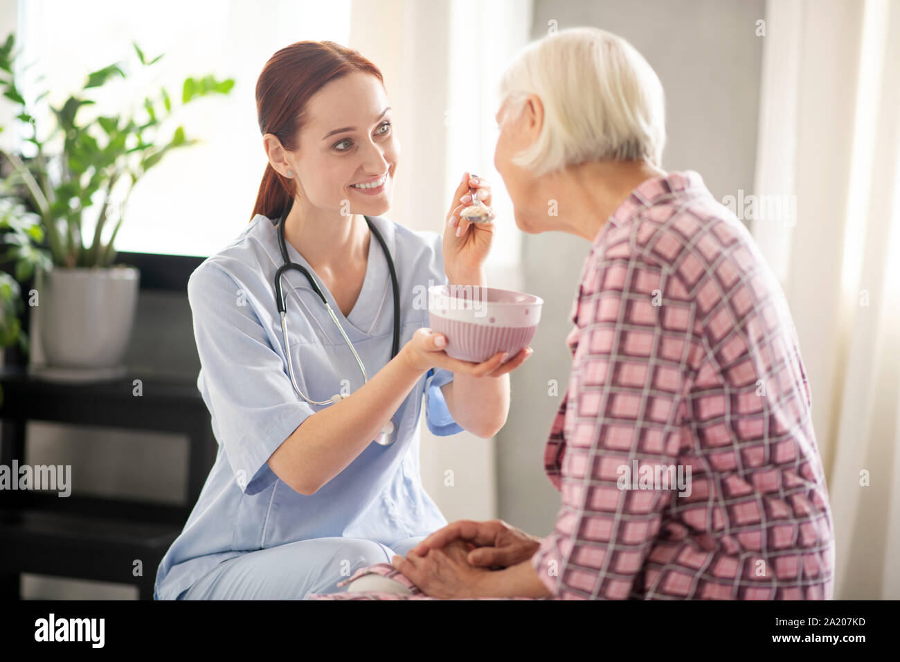Mature woman eating health breakfast hi-res stock photography and ...
