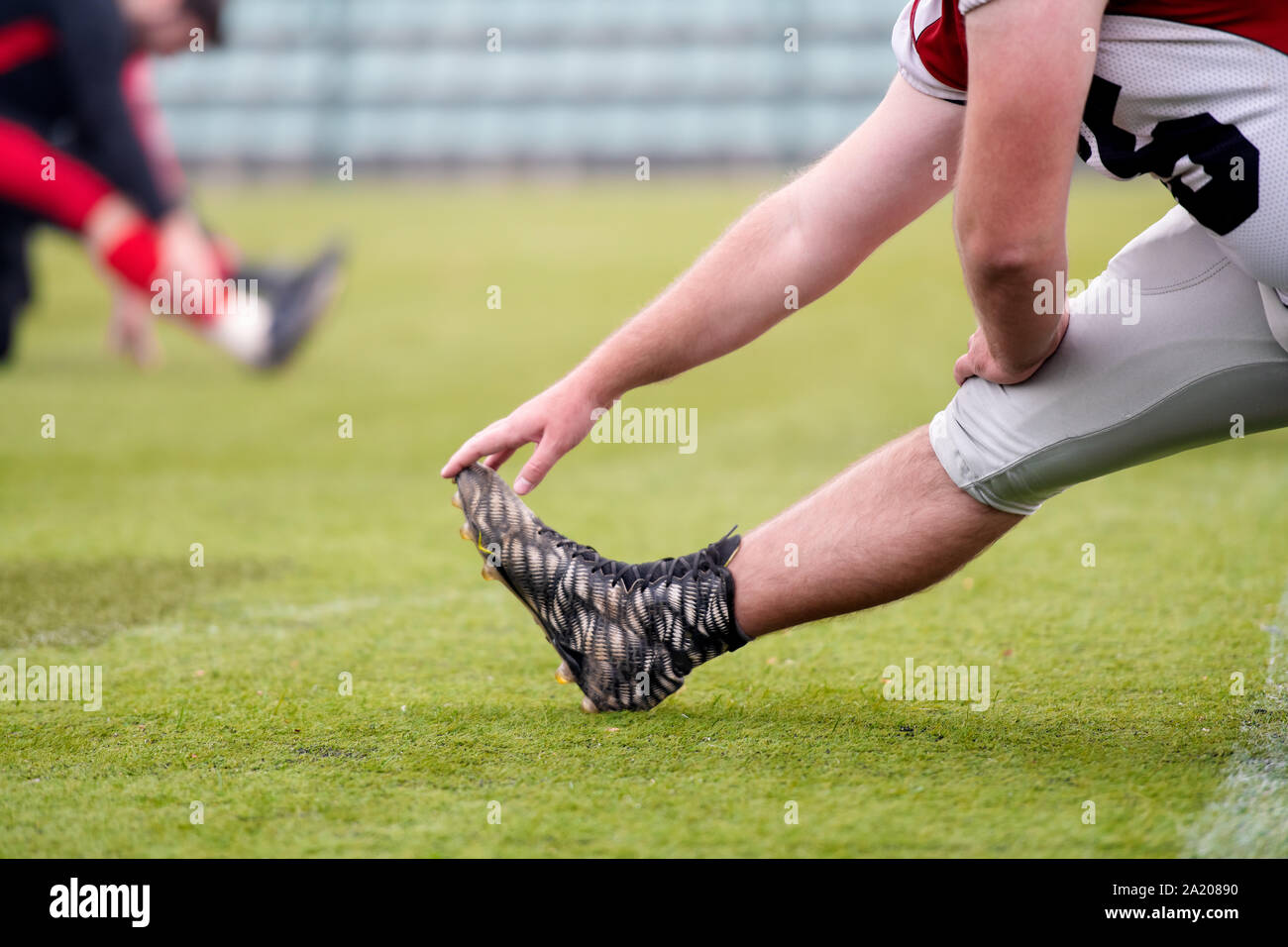 Warming up back stretching football hi-res stock photography and images ...