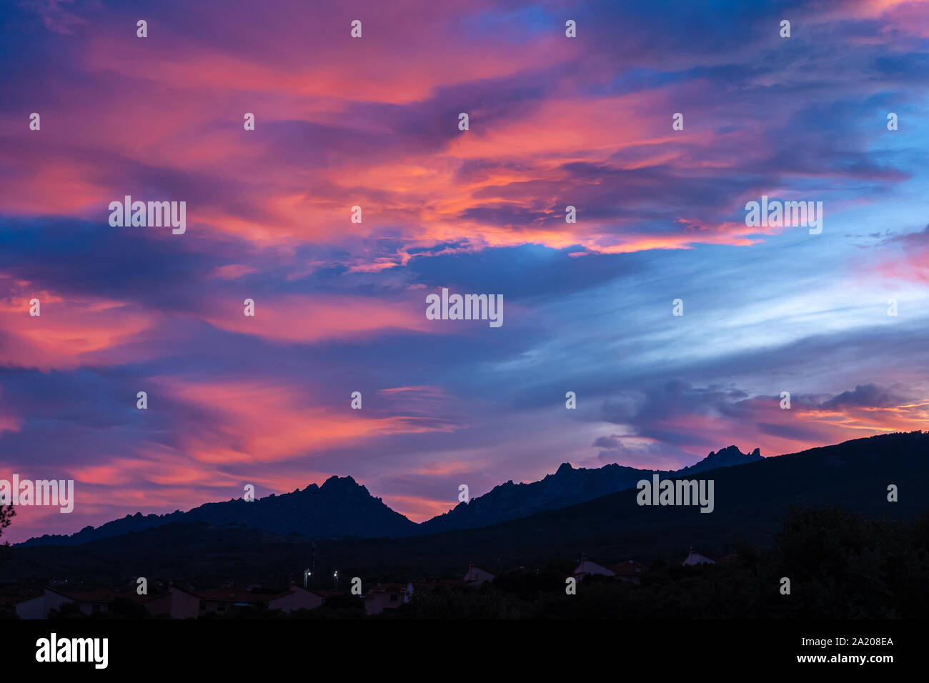Sunset over soft fluffy clouds hi-res stock photography and images - Alamy