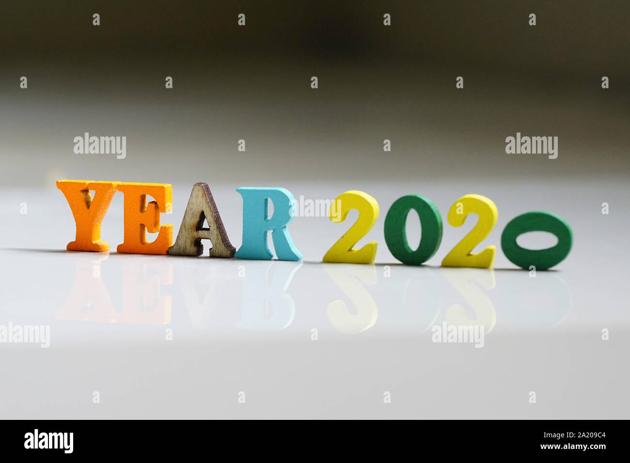 Colourful Year 2020 wording made of wooden alphabet letter on white ...